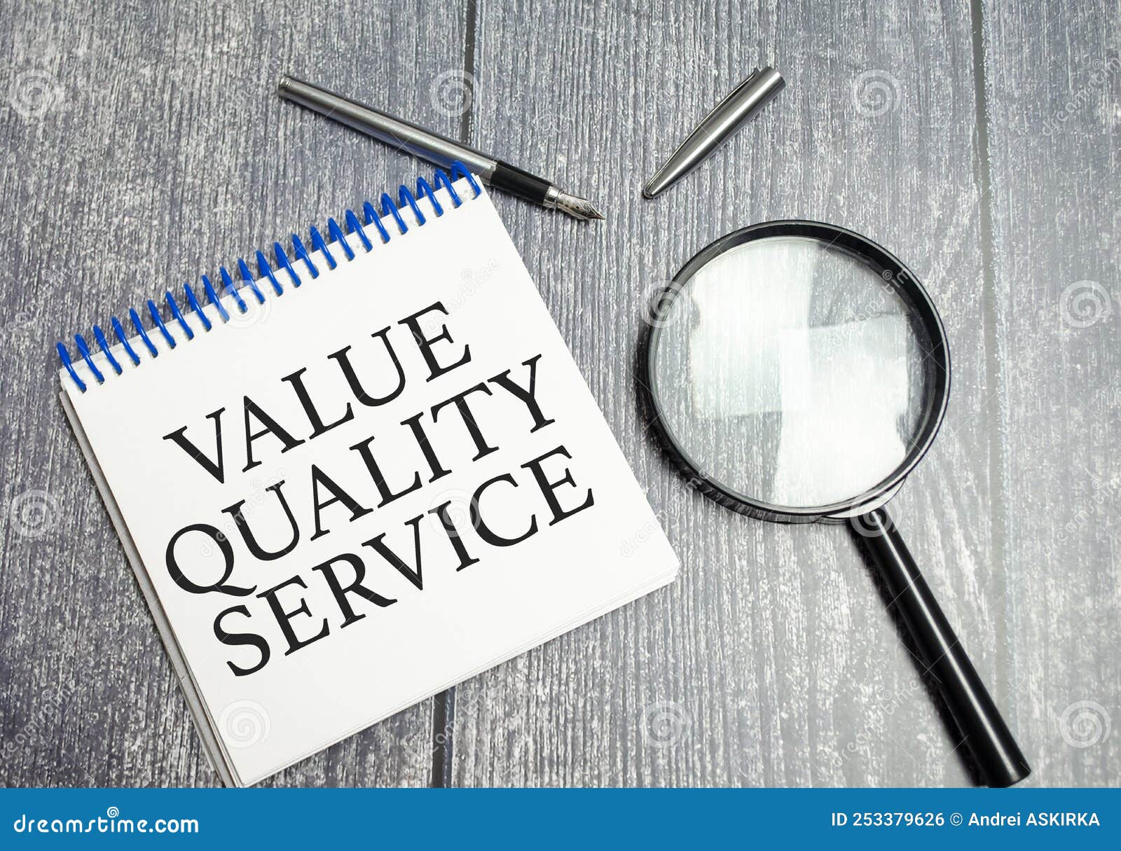 Value Quality Service Symbol on Notepad and Glasses and Magnifying ...