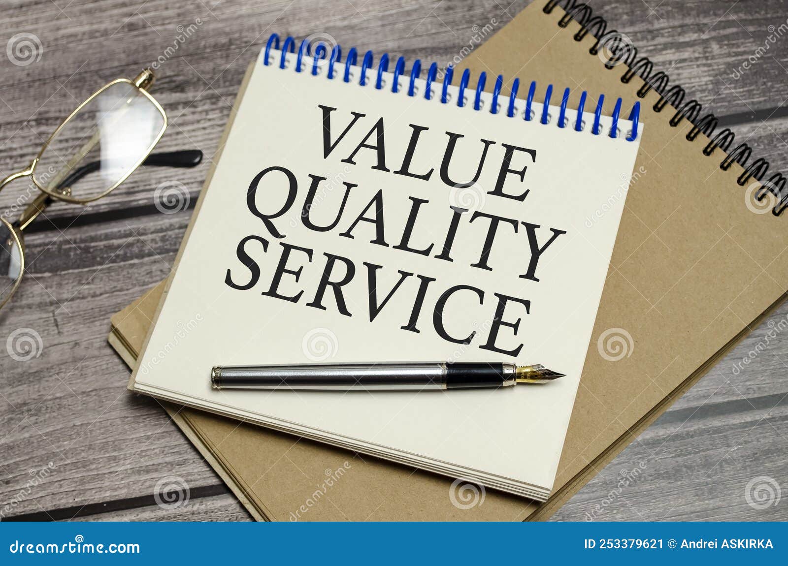 Value Quality Service Symbol on Notepad and Glasses and Pen Stock Image ...