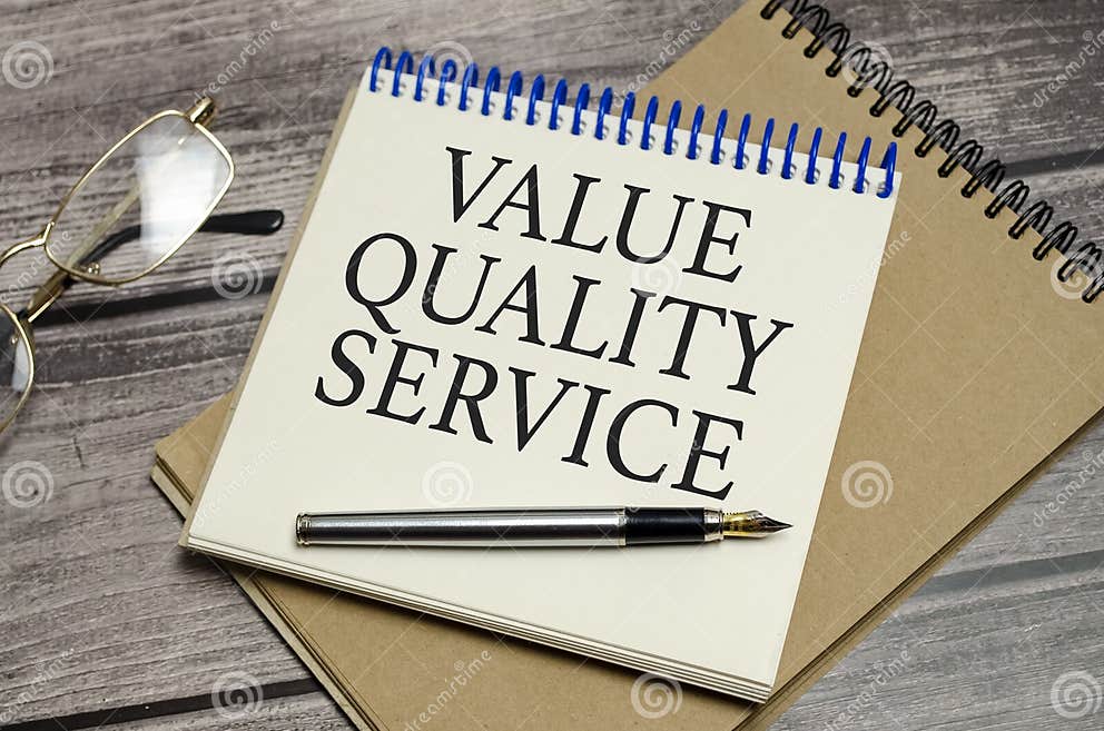 Value Quality Service Symbol on Notepad and Glasses and Pen Stock Image ...