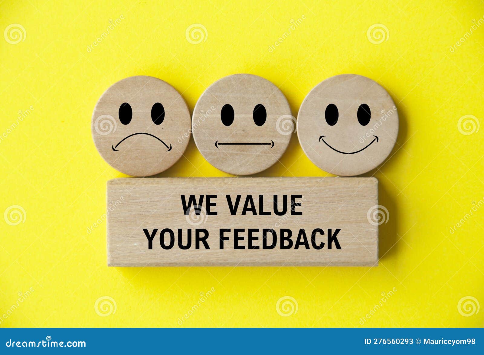 We Value Your Feedback Text on Wooden Block with Happy, Sad and Neutral ... We Value Your Feedback Text on Wooden Block with Happy, Sad and Neutral ...