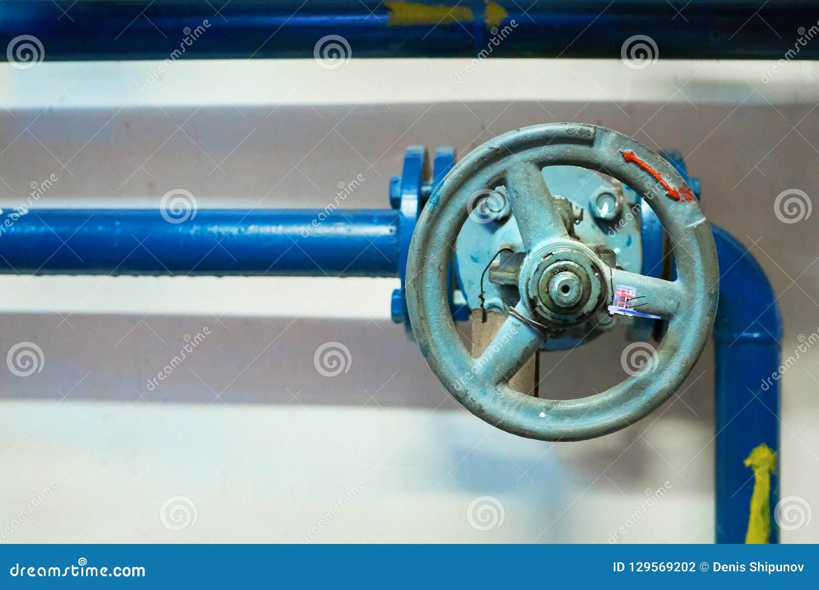 Valves Installed on Tubes Painted Blue. Industrial Background. Stock ...