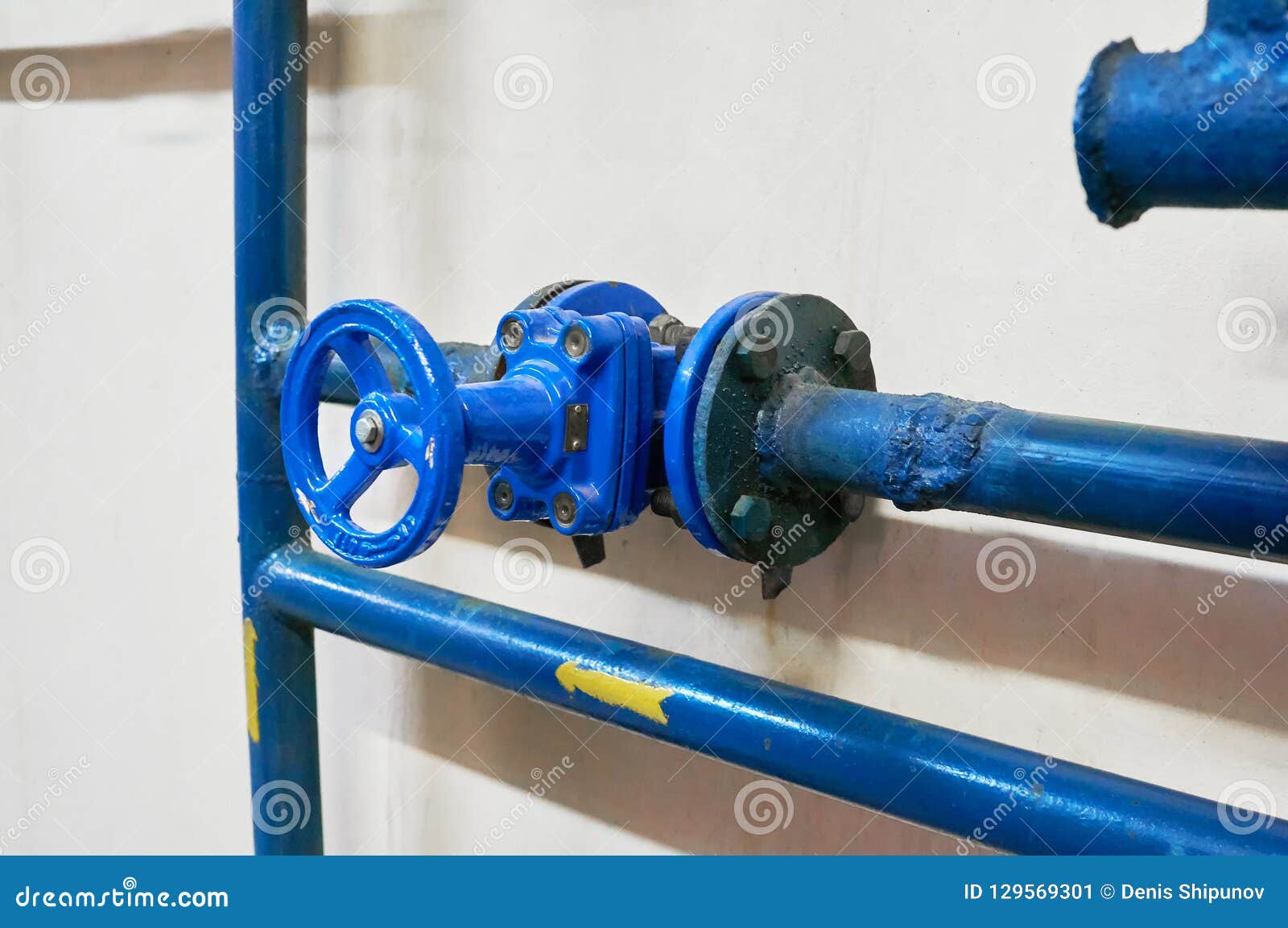 Valves Installed on Tubes Painted Blue. Industrial Background. Stock ...