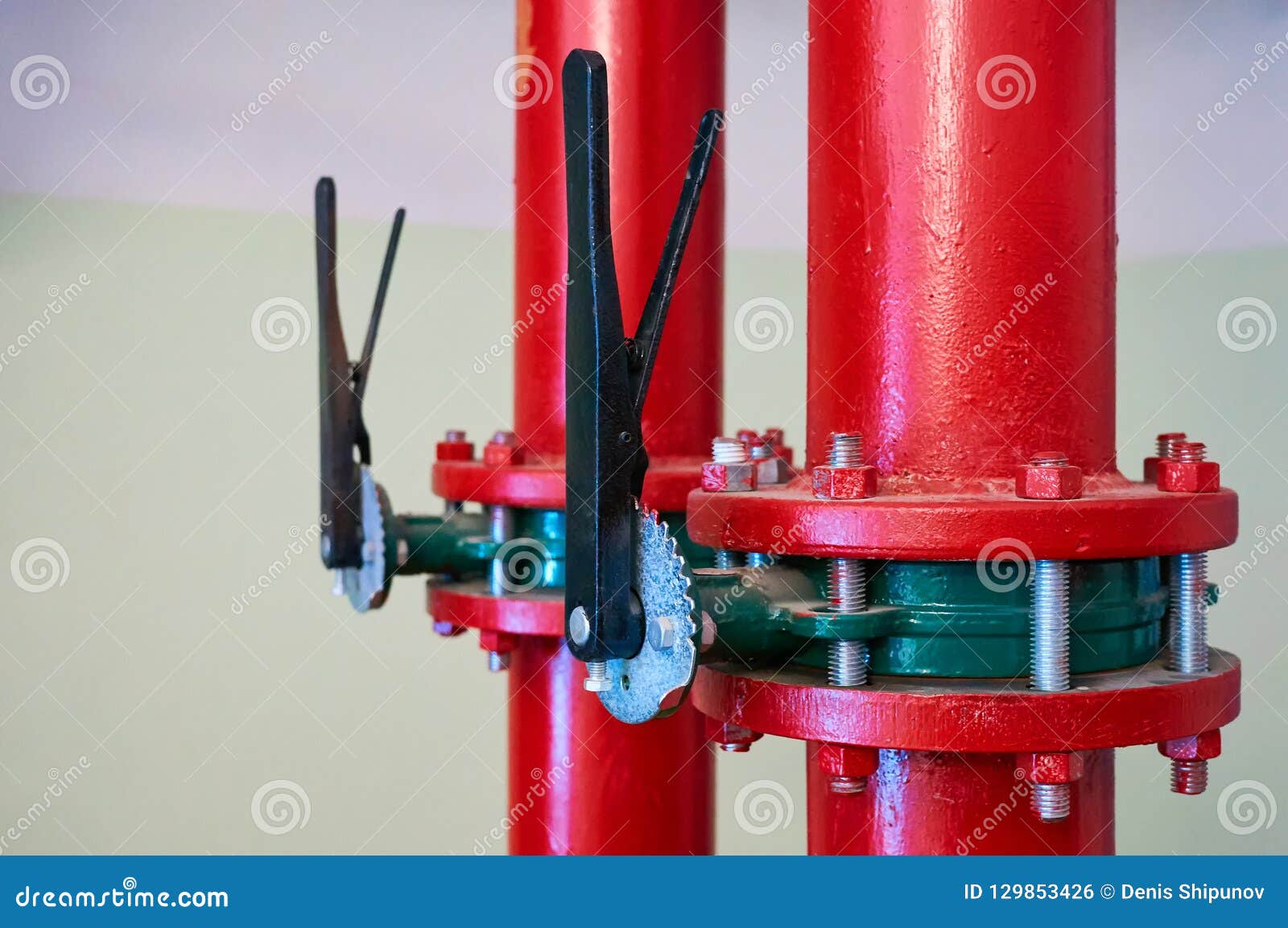 Valves Installed on Tubes Painted Red. Industrial Background. Stock ...