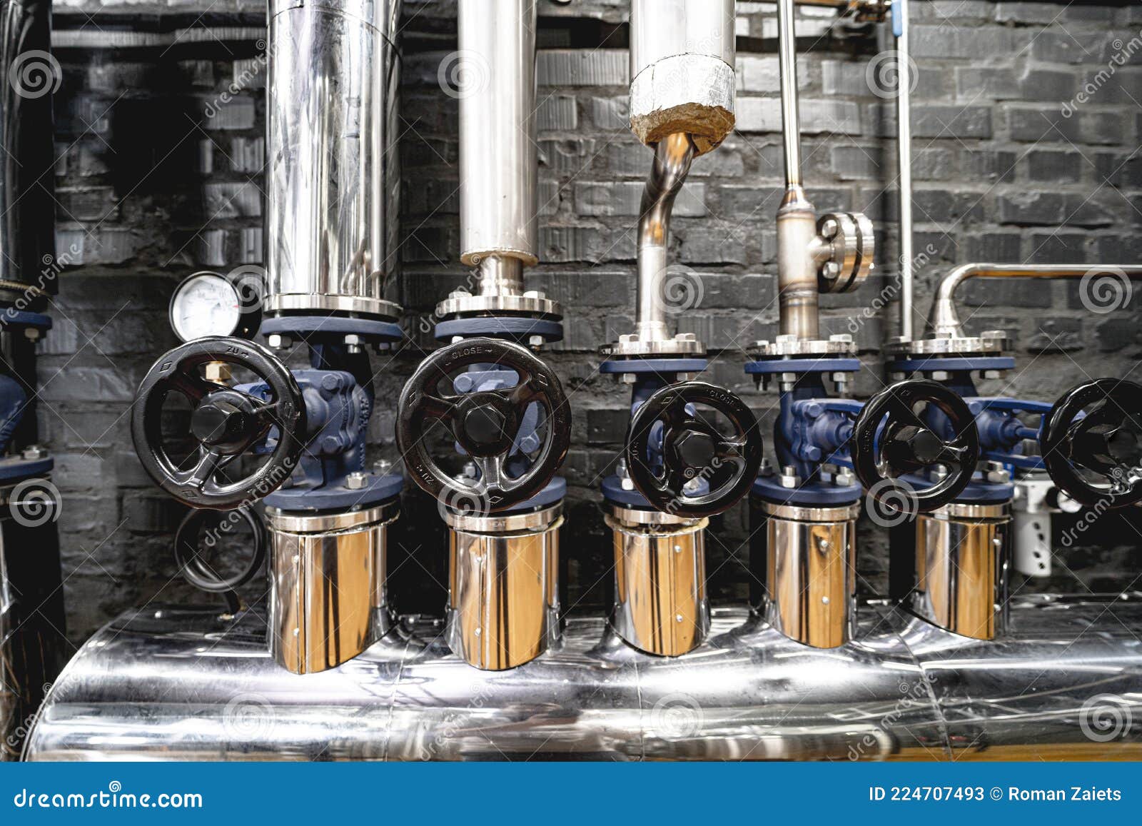 The Valves and Pipes at a Craft Modern Brewery Wall Stock Image - Image ...