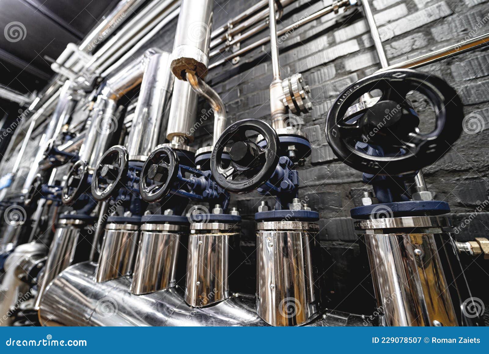 The Valves and Pipes at a Craft Modern Brewery Wall Stock Image - Image ...