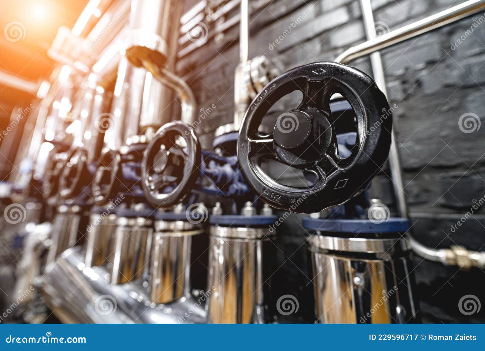 The Valves and Pipes at a Craft Modern Brewery Wall Stock Image - Image ...