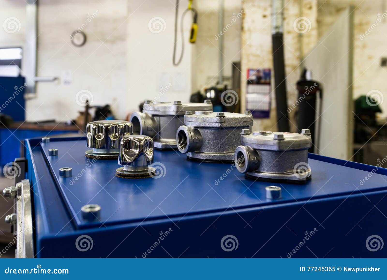 Valves in the workshop stock image. Image of metallic - 77245365
