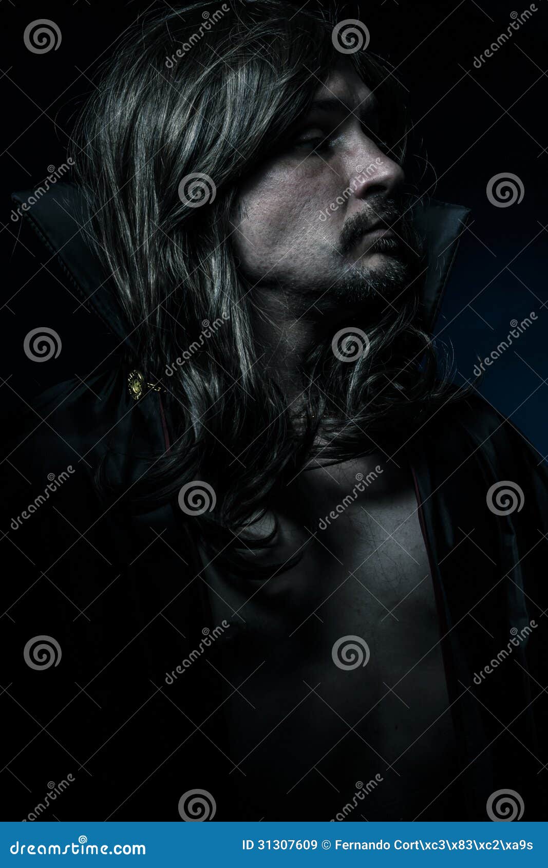 Vampire with Black Coat and Long Hair, Blue Light Stock Image - Image ...