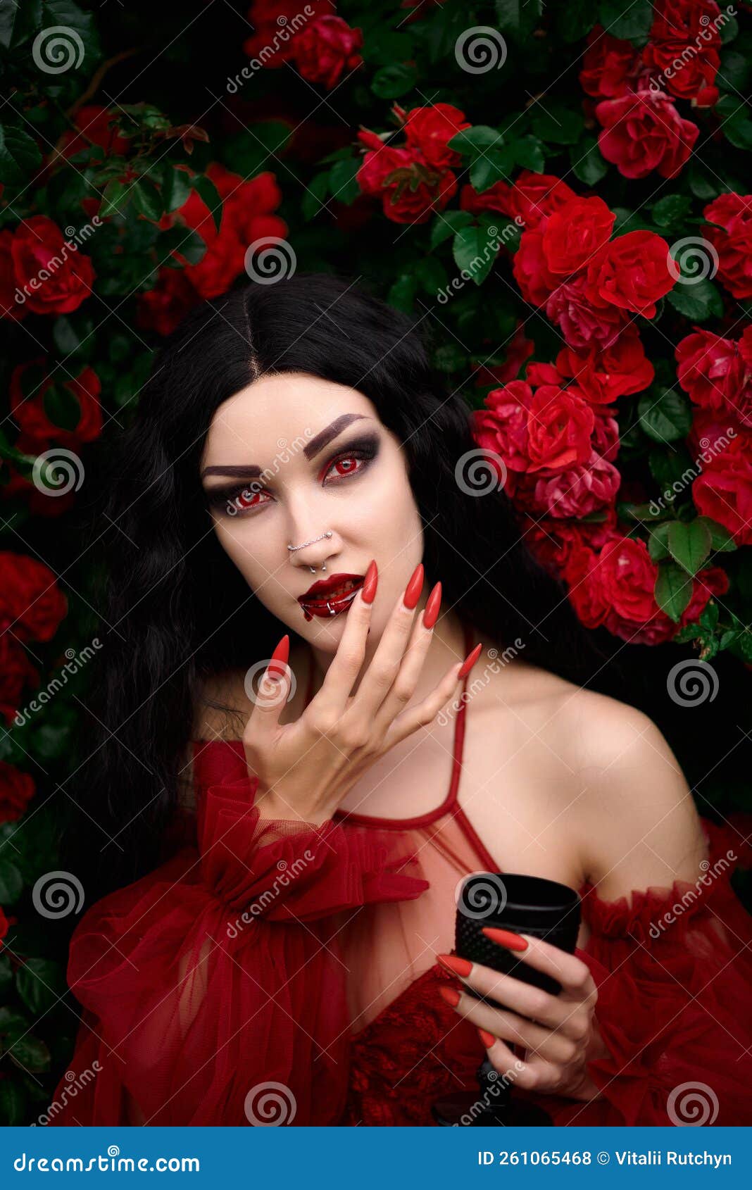 Vampire Girl on a Background of Red Roses Stock Photo - Image of bloody ...