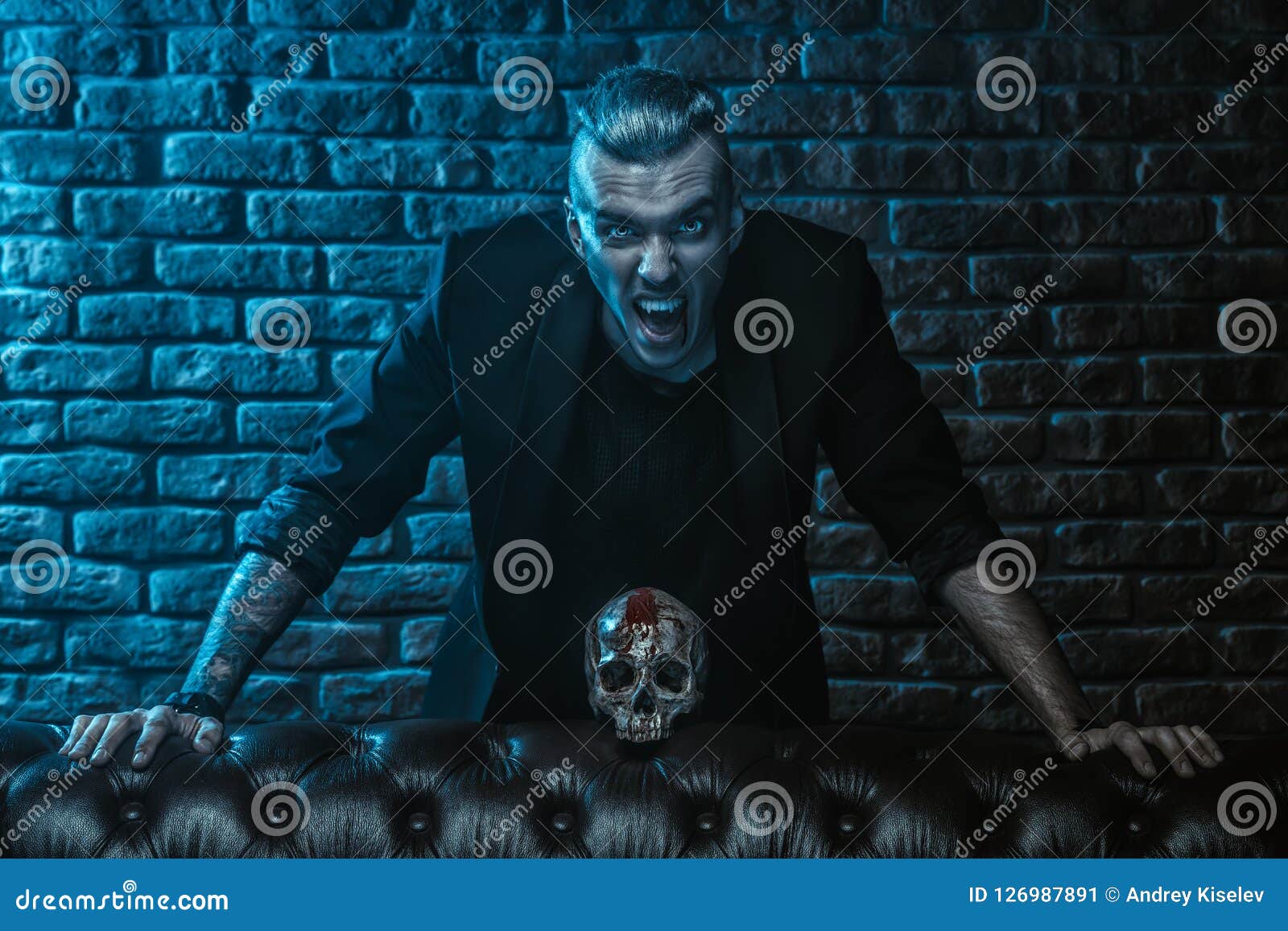Shouting Vampire with Skull Stock Image - Image of hairstyle, light ...
