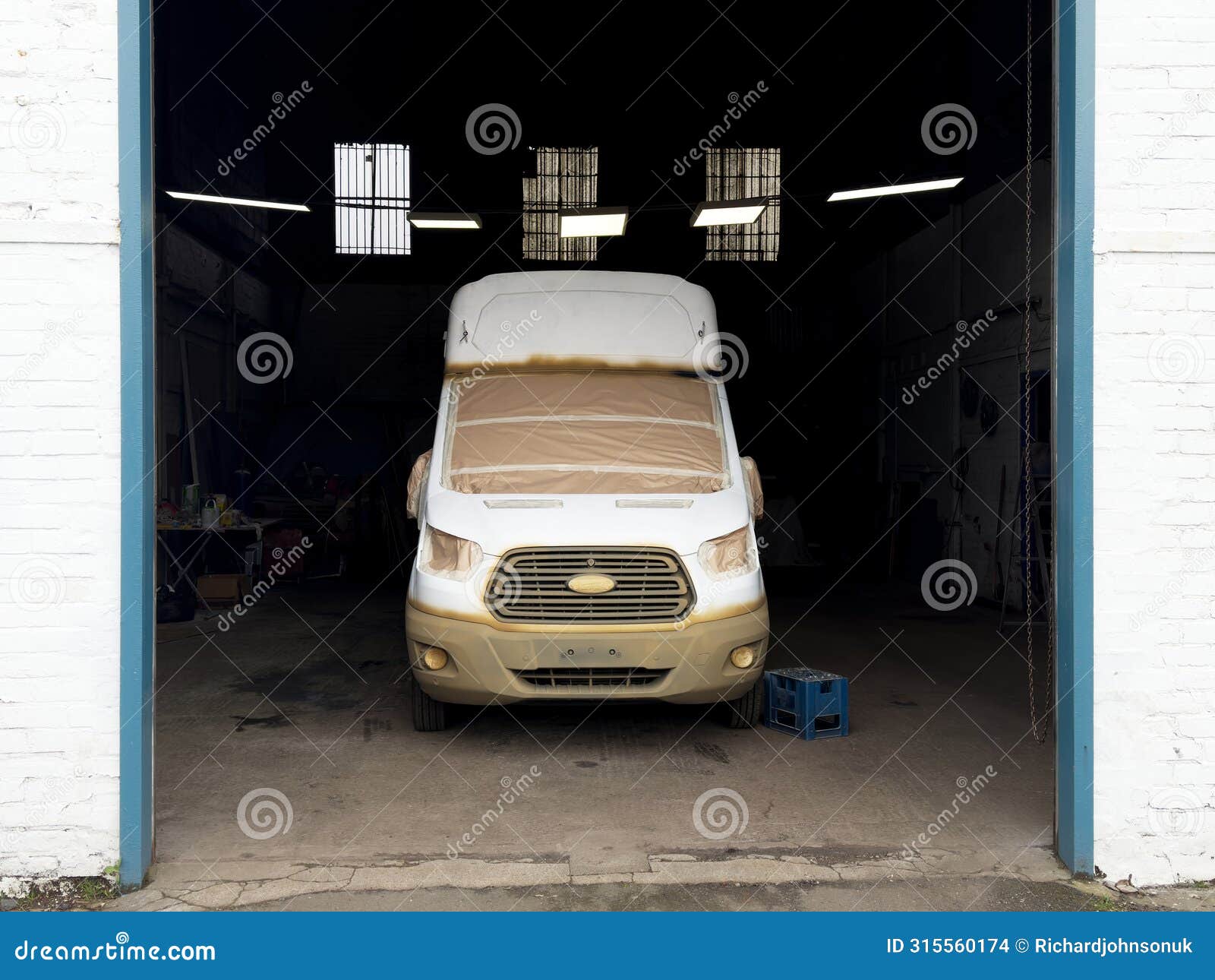 Van in Garage Being Refurbished and Spray Painted Stock Photo - Image ...