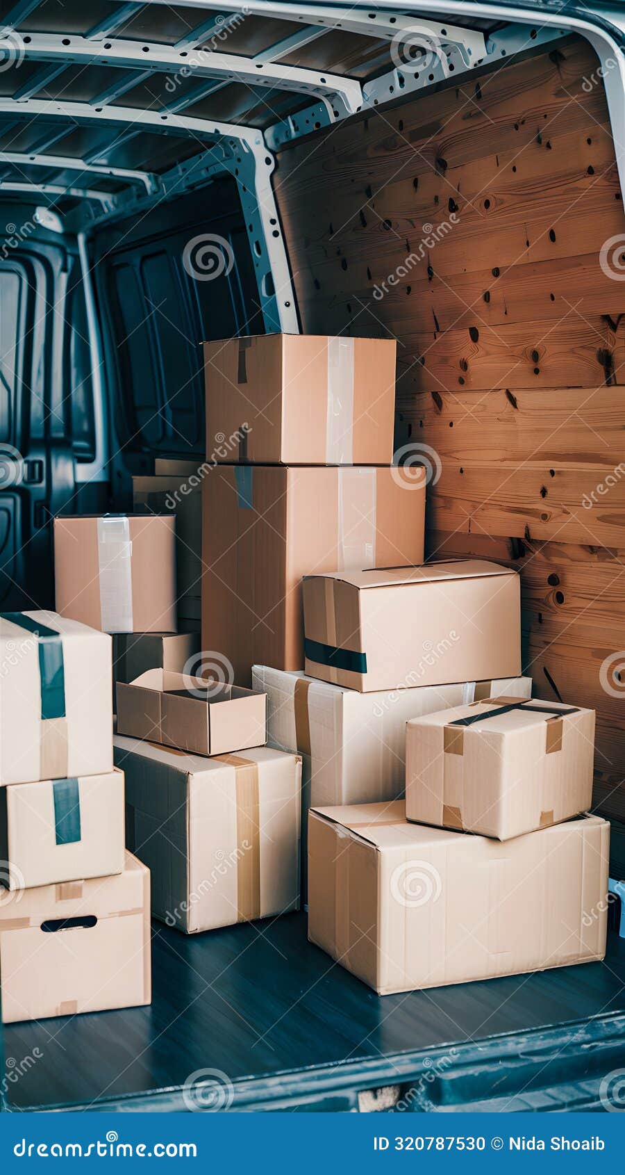 Van Interior with Assorted Cardboard Boxes Stacked and Scattered ...