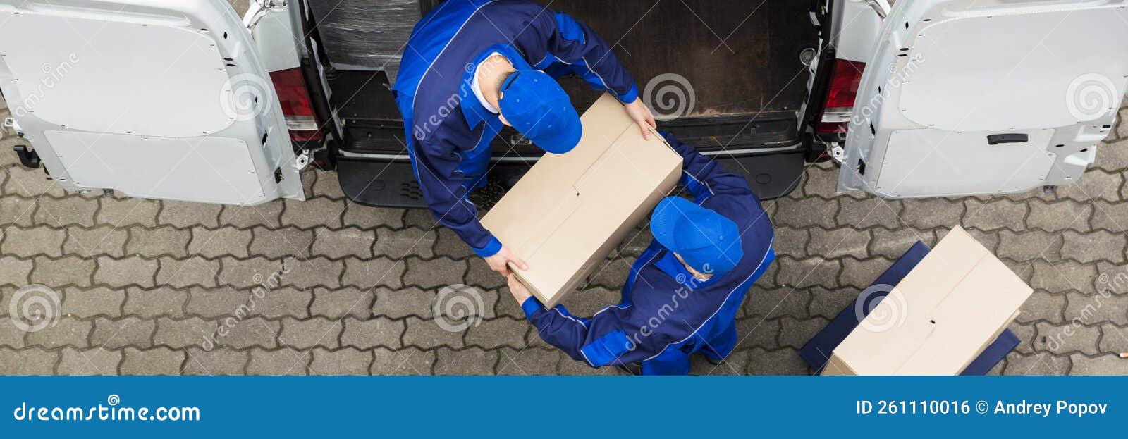 Van Movers Loading Cardboard Boxes Stock Photo - Image of open, door ...
