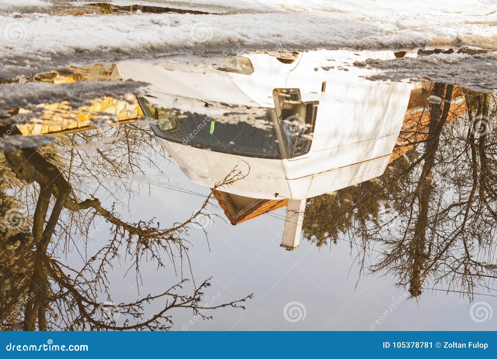 Van reflected in puddle stock image. Image of snow, auto - 105378781