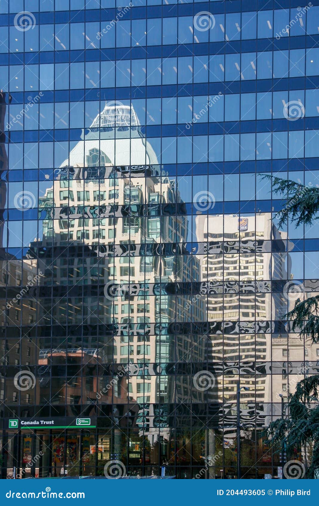 Reflection in the Canada Trust Building in Vancouver on August 14, 2007 ...
