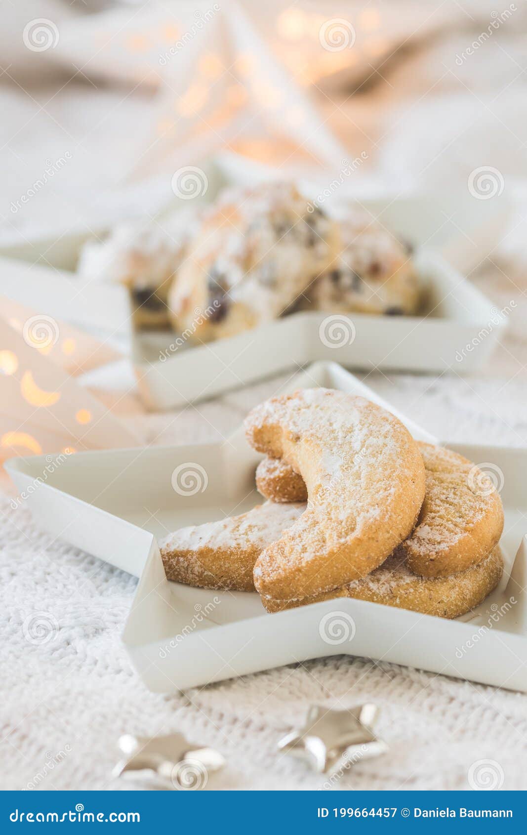 Vanilla Biscuits and Mini Stollen on White Star Plates on a White ...