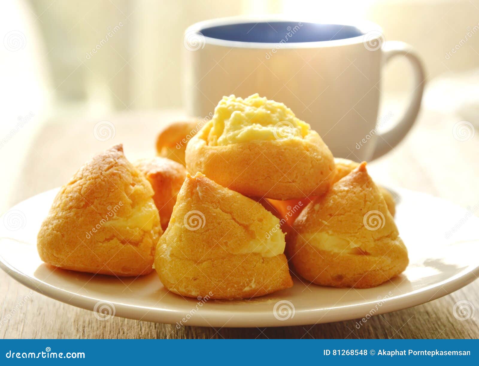 Vanilla Cream Puff on Dish and Coffee Cup Stock Photo - Image of water ...