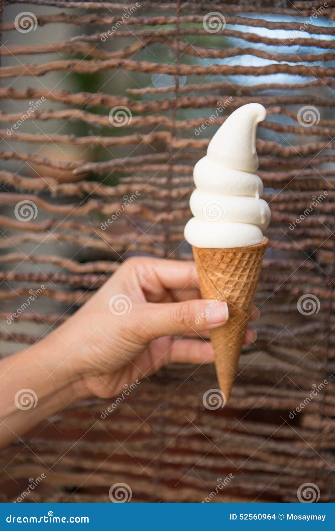 Vanilla Ice Cream in a Cone Stock Photo - Image of wooden, cream: 52560964