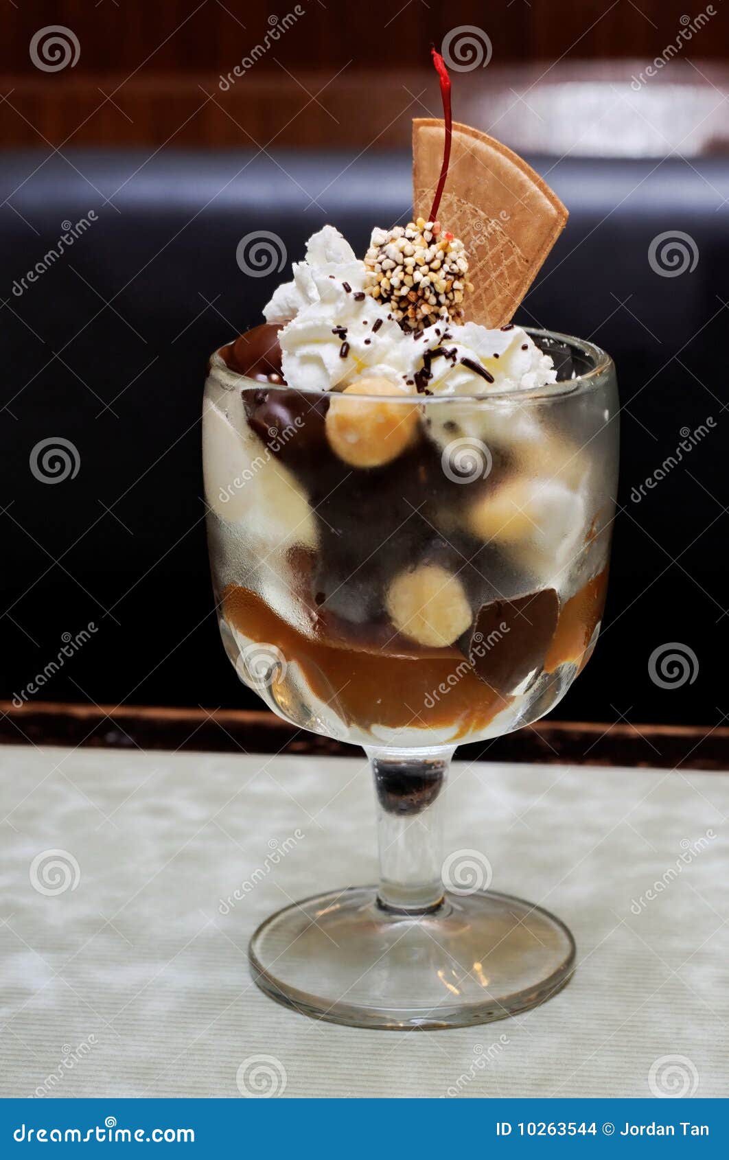 Vanilla Ice-cream Sundae with Macadamia Stock Photo - Image of cream ...