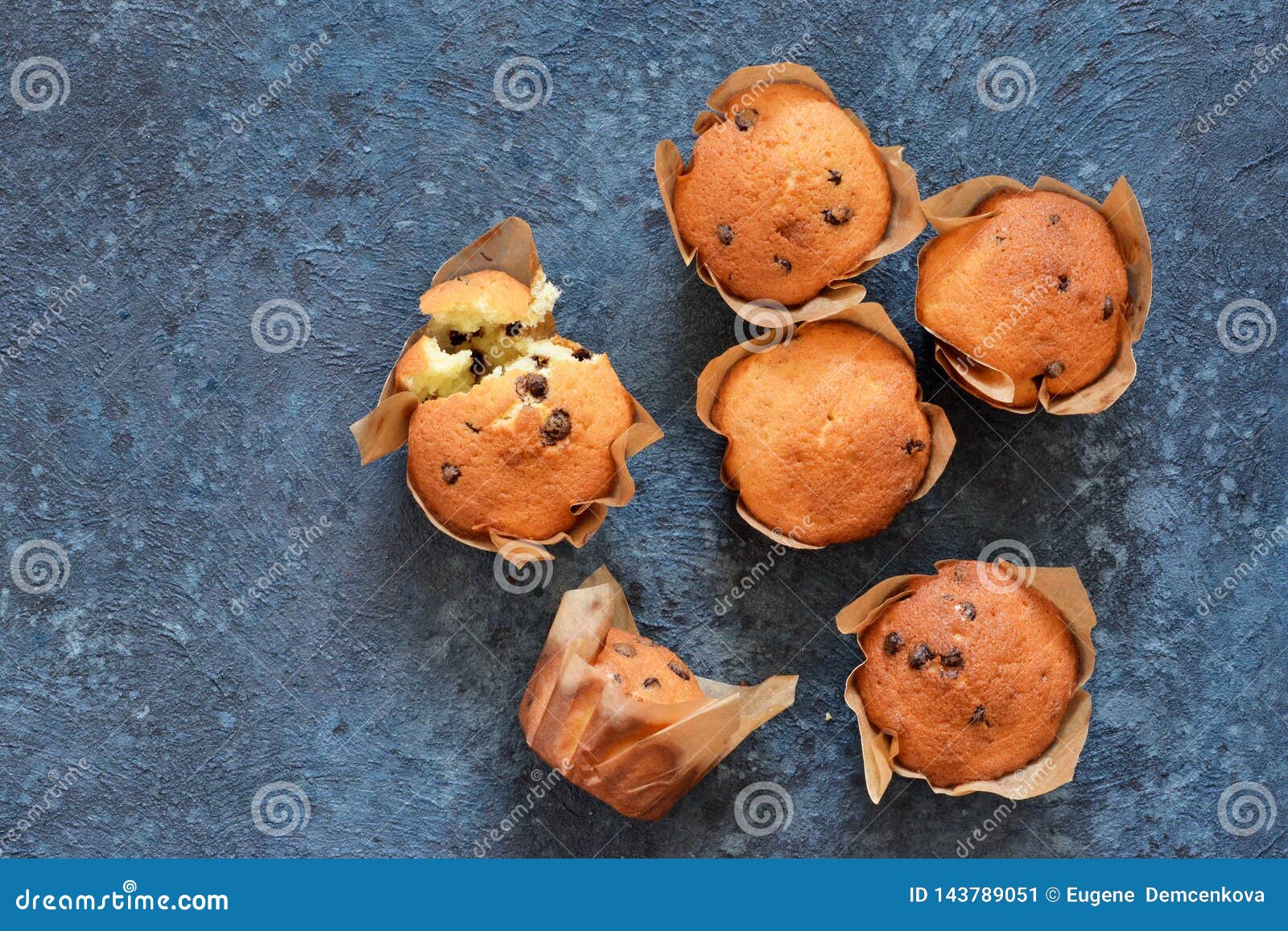 Vanilla Muffins in Paper Form with Chocolate Drops on a Concrete ...