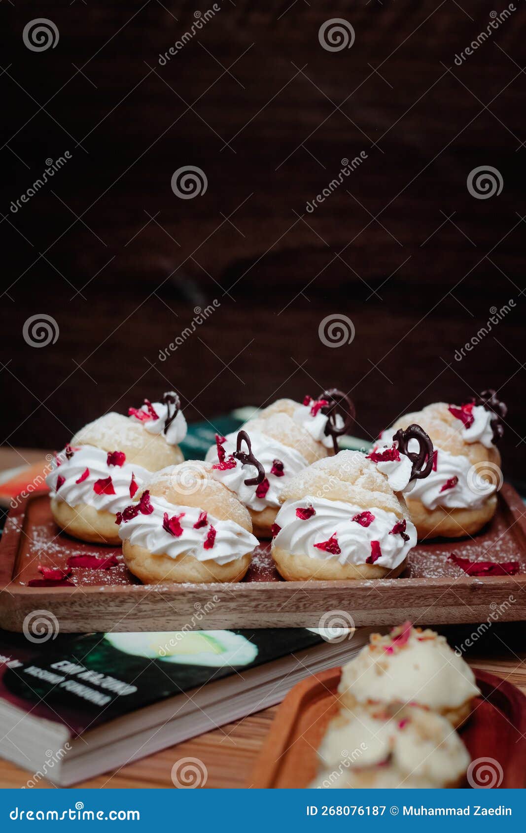 Vanilla Soes Cakes ( Soes Vla ) Served in Plate on Table. Selective ...