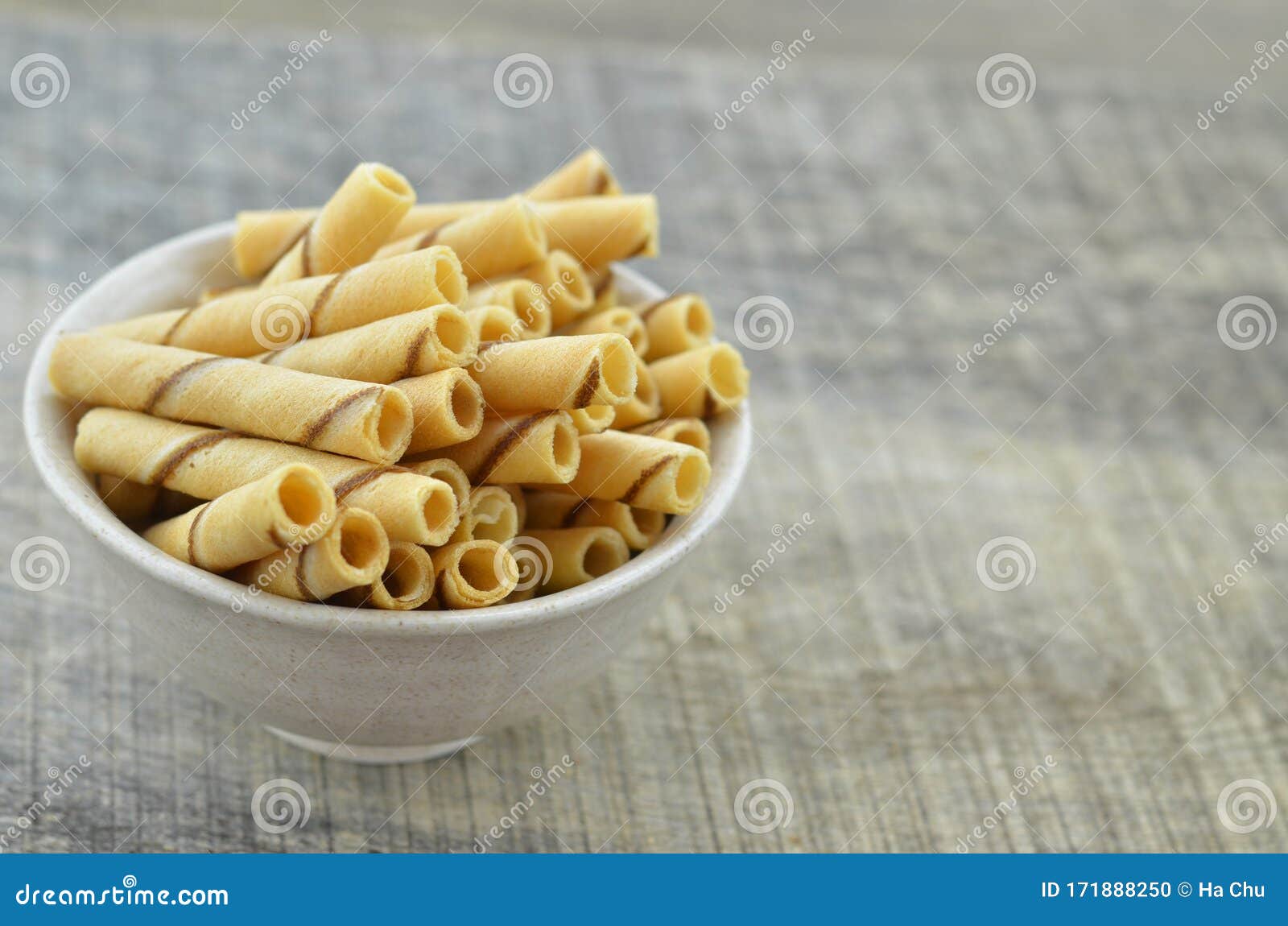 Vanilla Waffle Roll Sticks in Ceramic Bowl Stock Photo - Image of ...