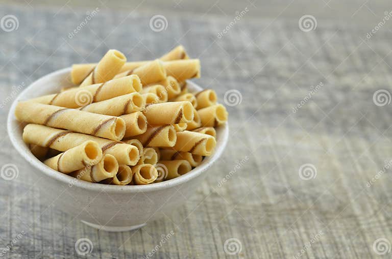 Vanilla Waffle Roll Sticks in Ceramic Bowl Stock Photo - Image of ...