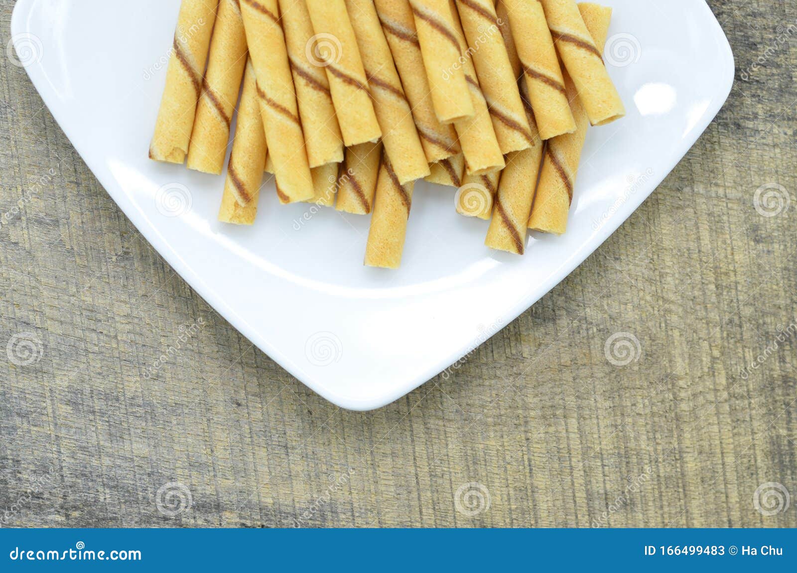 Vanilla Waffle Roll Sticks in White Plate Stock Image - Image of food ...