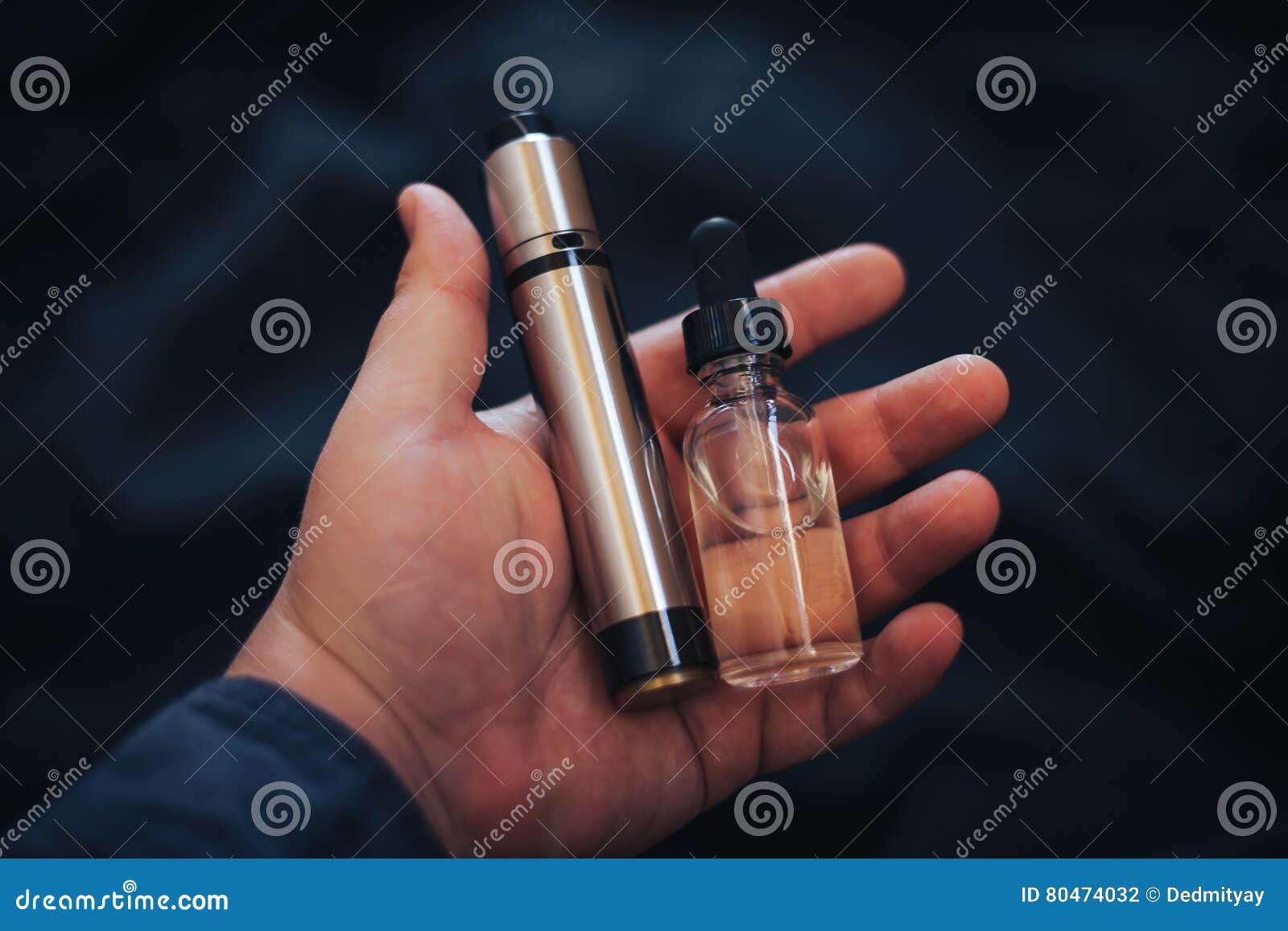 Vaping Device in in the Man`s Hand. Electronic Cigarette, Vape Stock ...