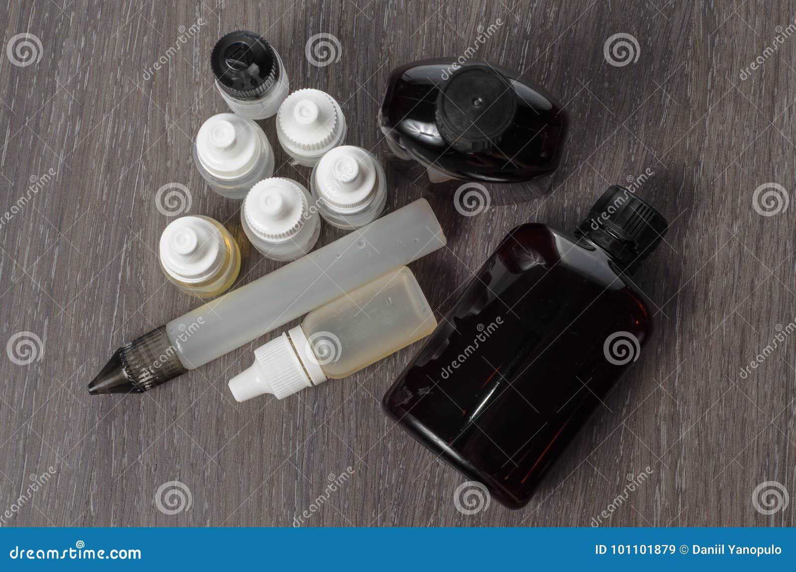 Vaping E-cigarette Liquid on Wooden Background Stock Image - Image of ...