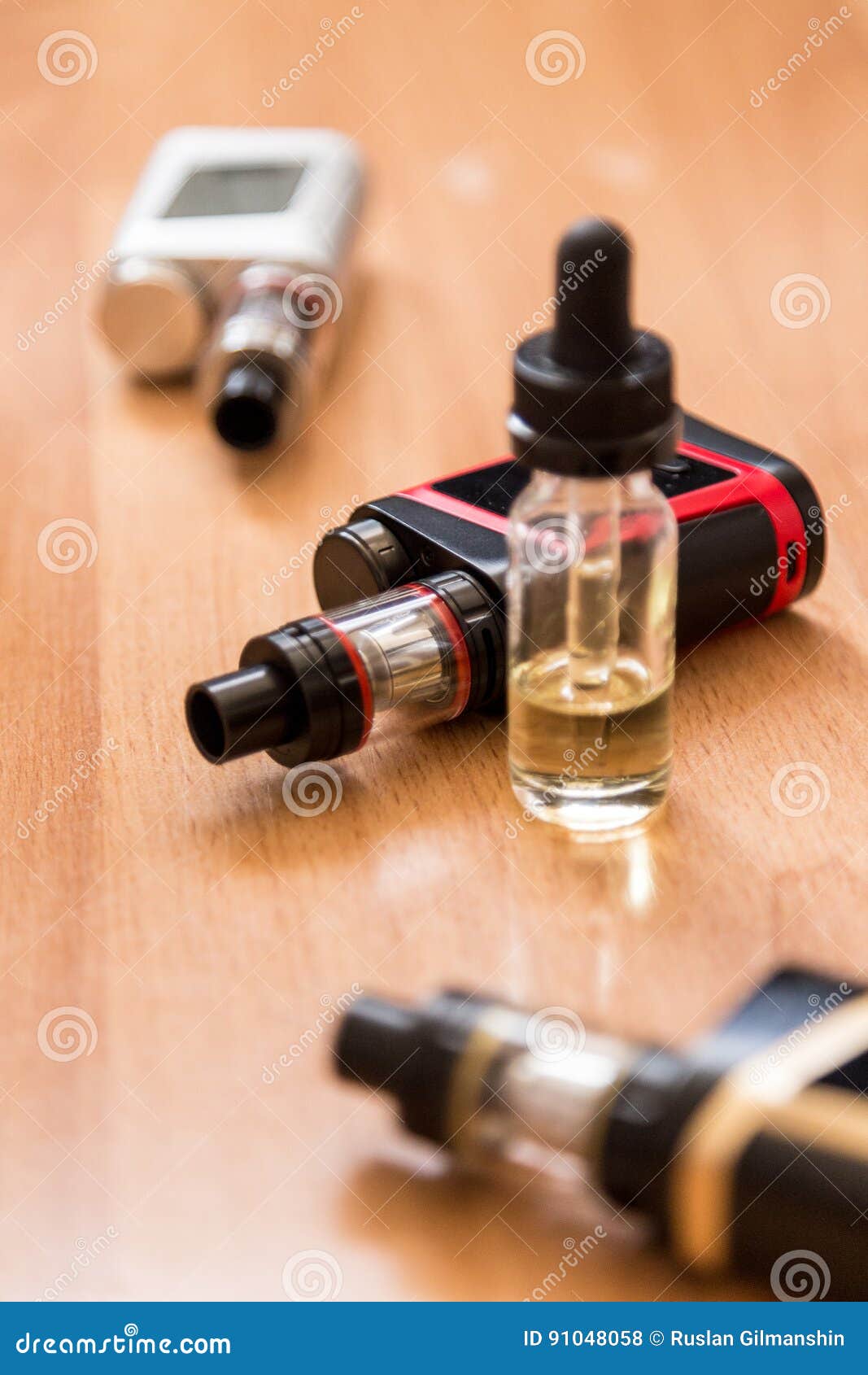 Vaping Electronic Mech Mod and Vape Liquid. Stock Photo - Image of ...