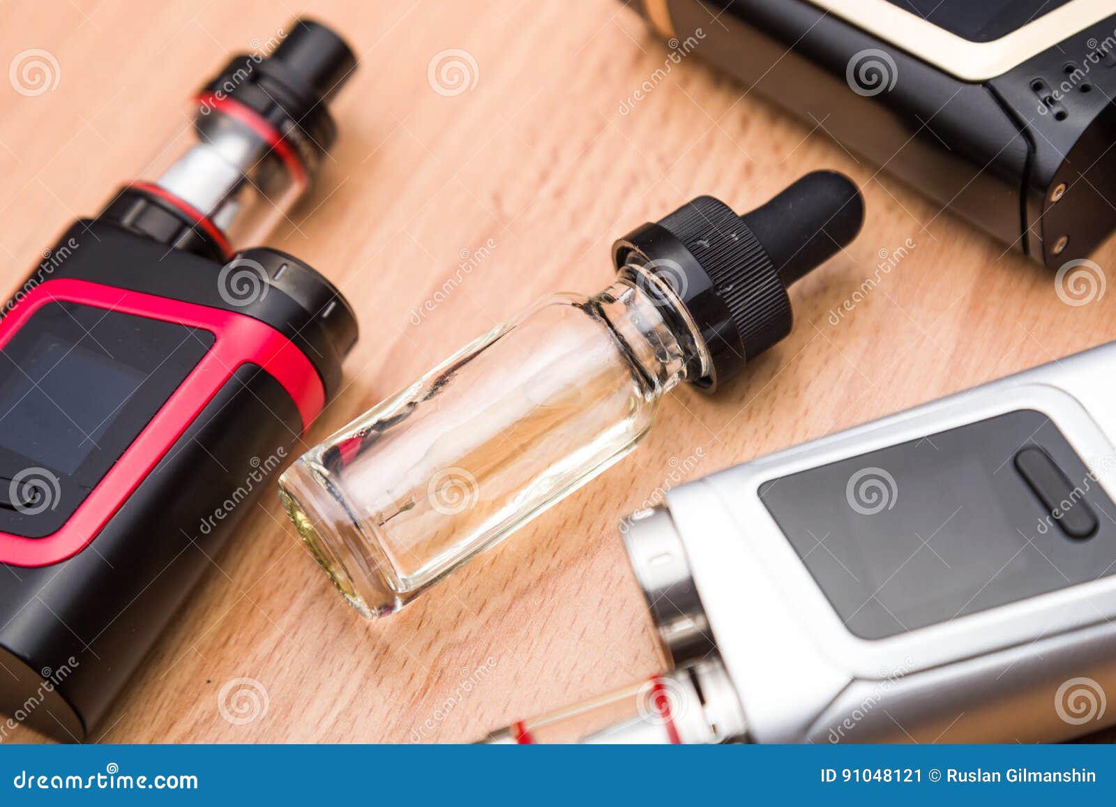 Vaping Electronic Mech Mod and Vape Liquid. Stock Image - Image of ...