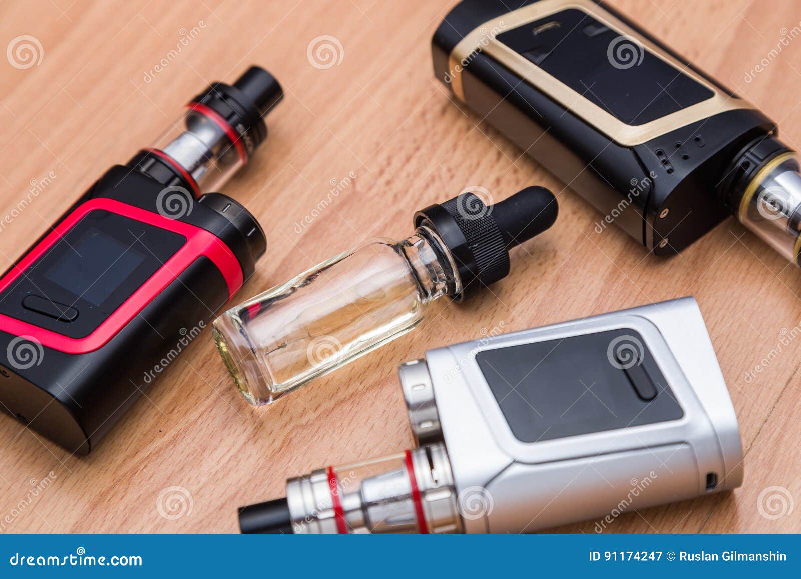 Vaping Electronic Mod and Vape Liquid. Stock Image - Image of bottle ...