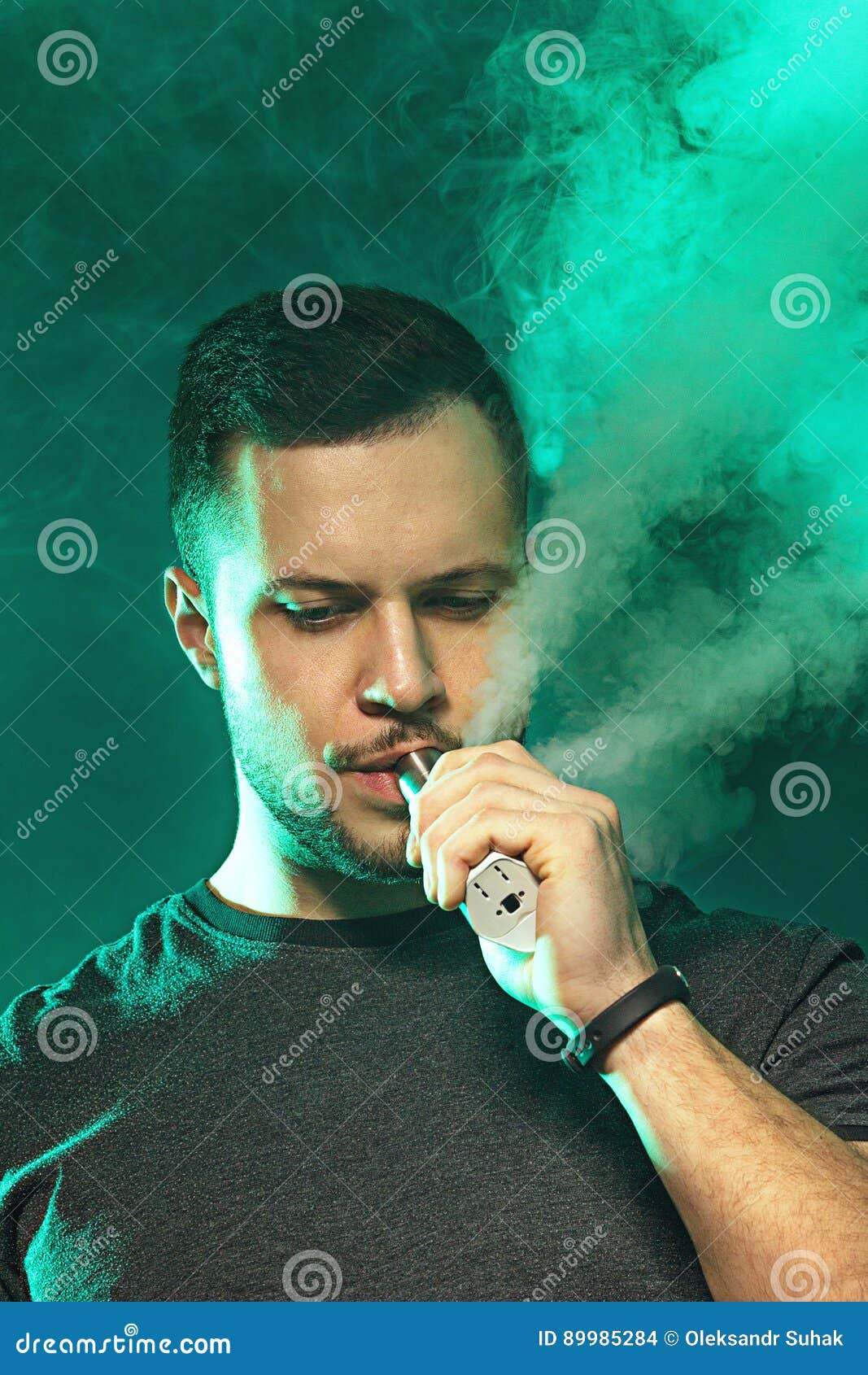 Vaping Man Holding a Mod. a Cloud of Vapor Stock Photo - Image of ...