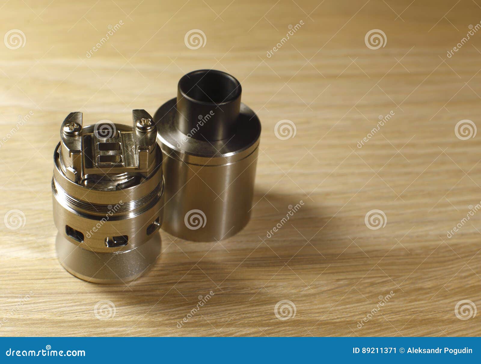 Vaping Rebuildable Dripping Atomizer RDA on Wooden Surface with Copy ...