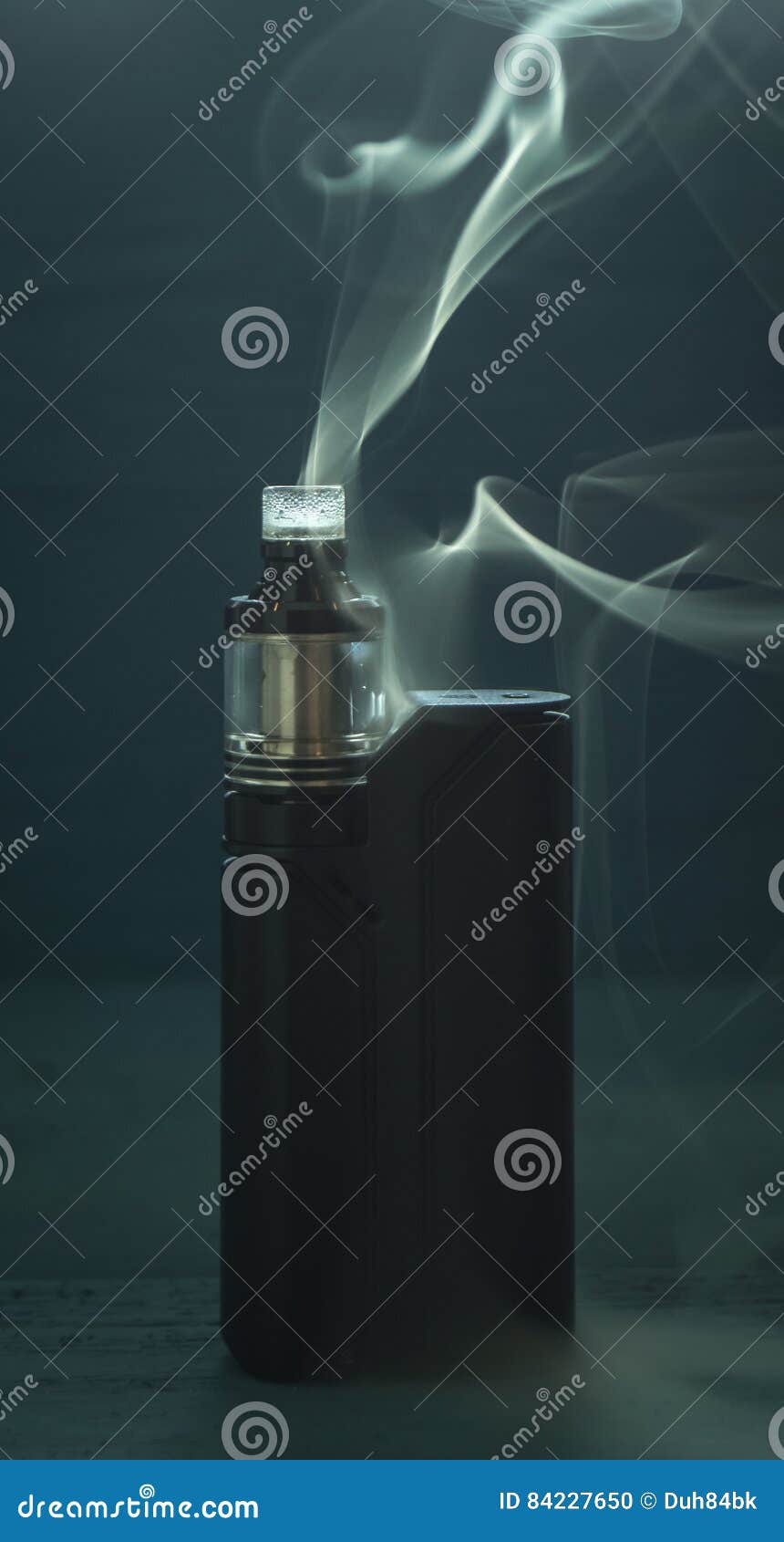 Vaporizer on a Blue Background Stock Photo - Image of gadget, cigarette ...