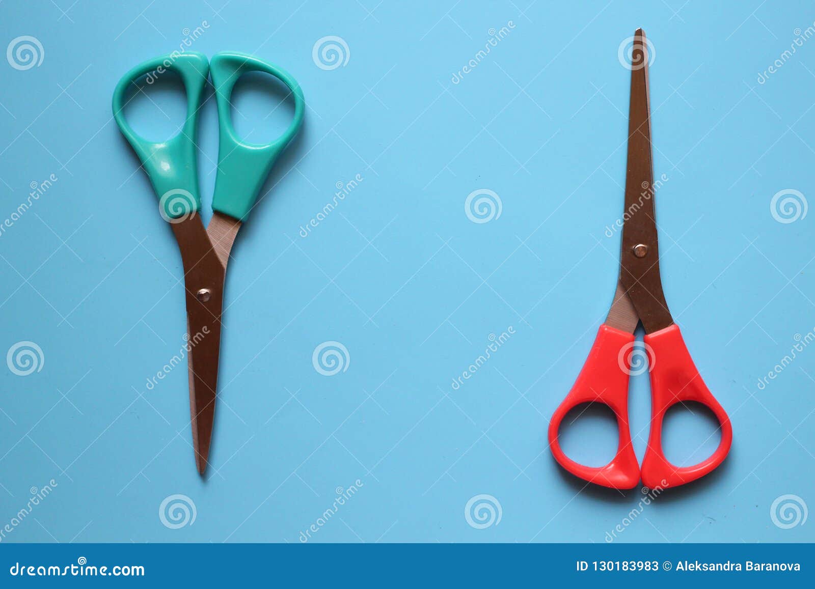 Variations of Layouts of Stationery Items, Scissors on a Colored ...