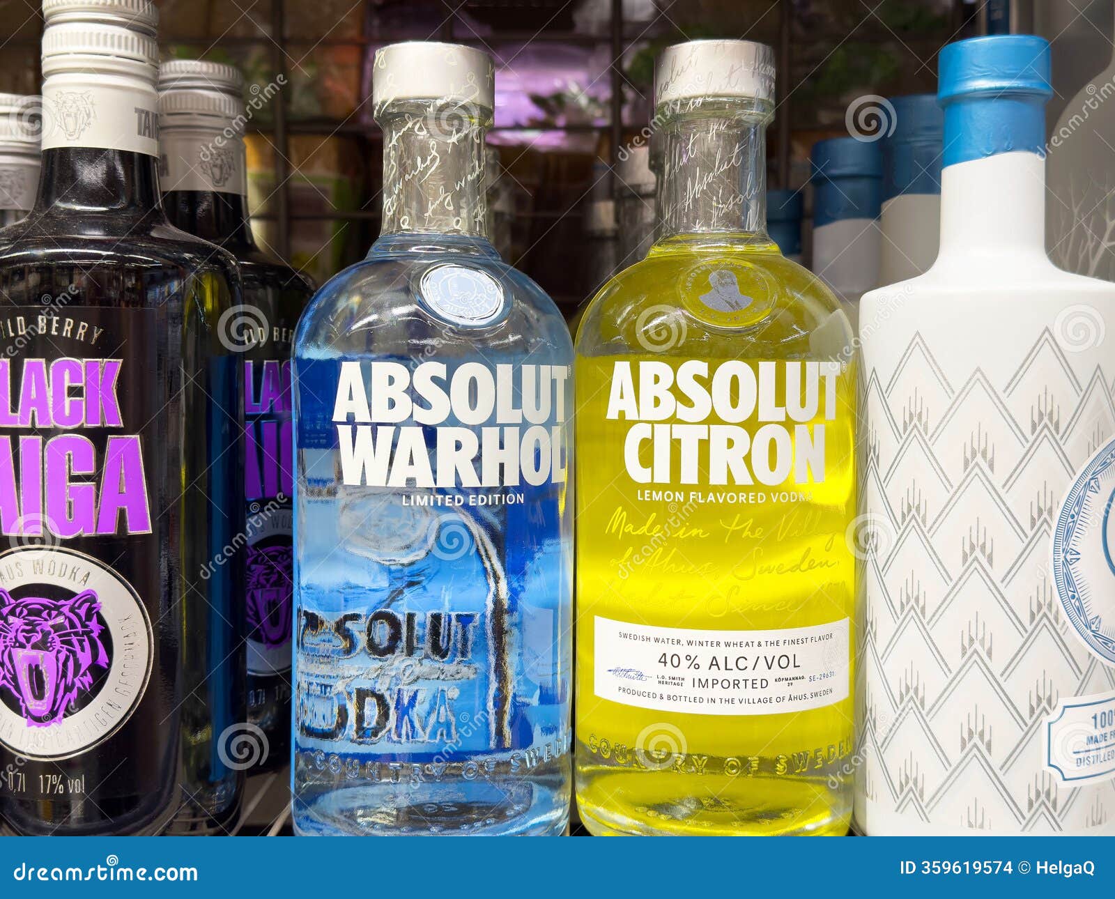 Variety of Absolut Vodka Bottles Displayed in a Liquor Store Setting ...