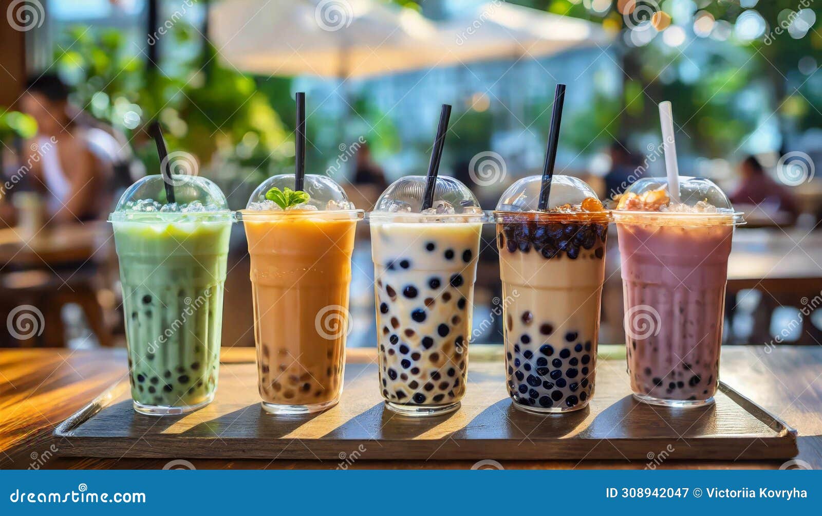 Variety of Boba Bubble Tea with Straws on Table in Cafe Stock ...
