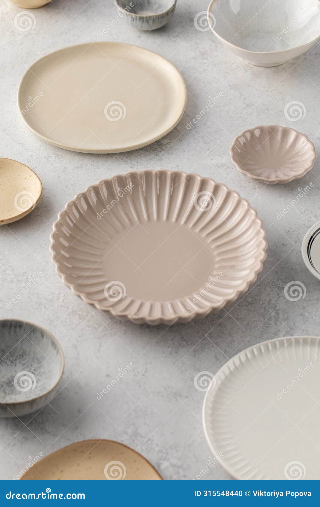A Variety of Ceramic Empty Plates and Bowls on the Table. Kitchen, Menu ...