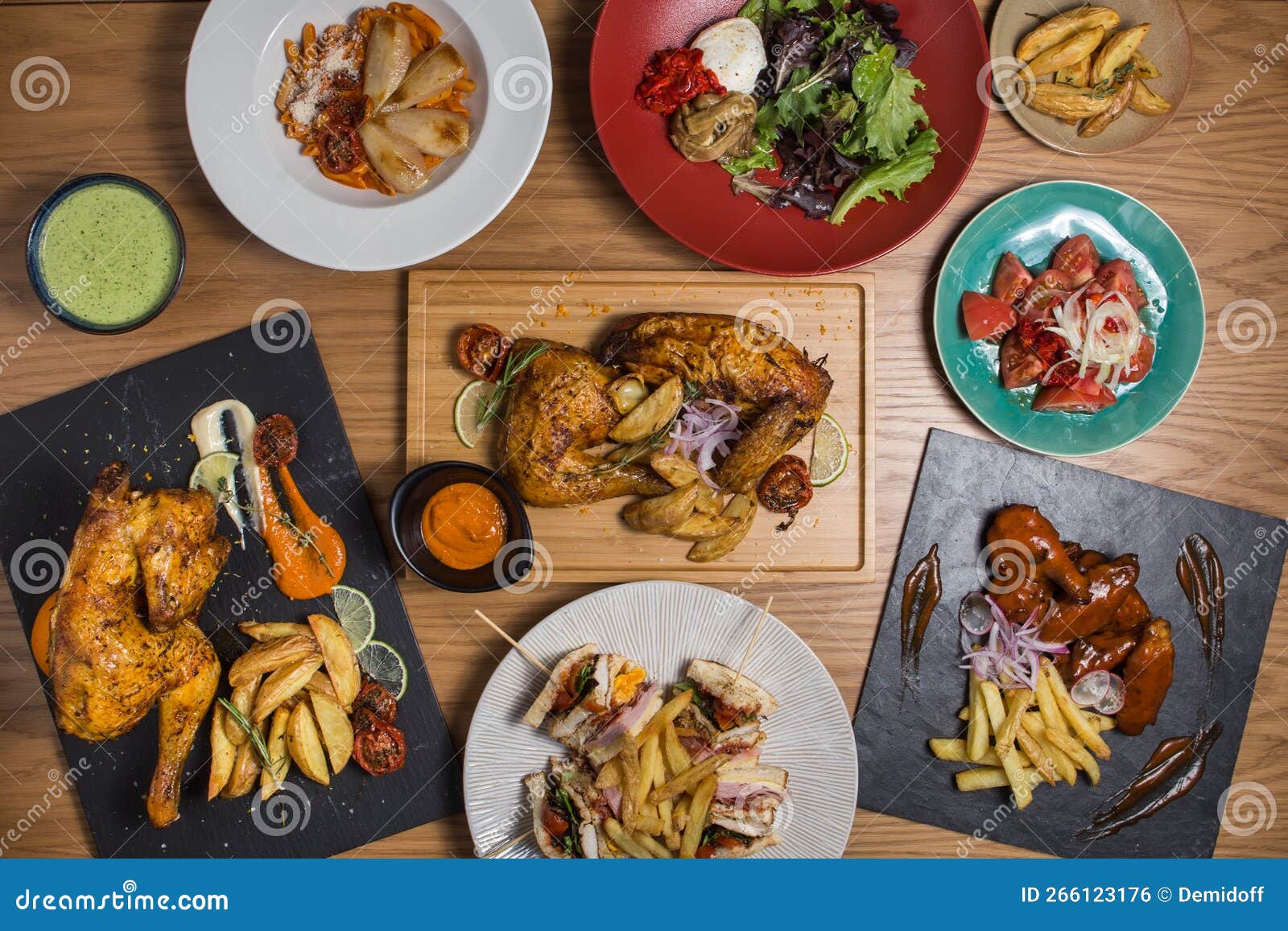 Variety of chicken dishes stock photo. Image of wood - 266123176