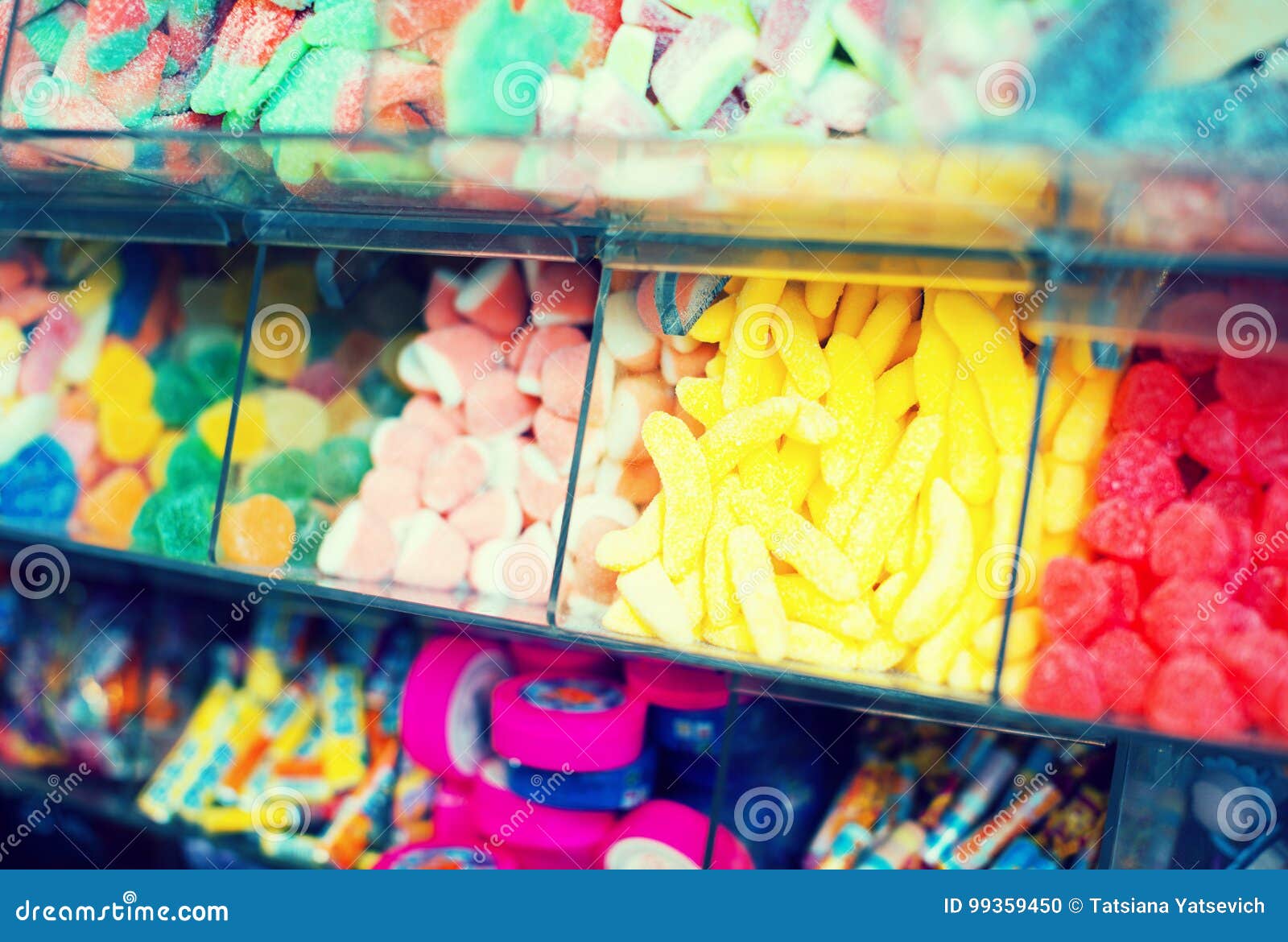 Variety of Colored Sweets on Shelves Stock Photo - Image of round ...