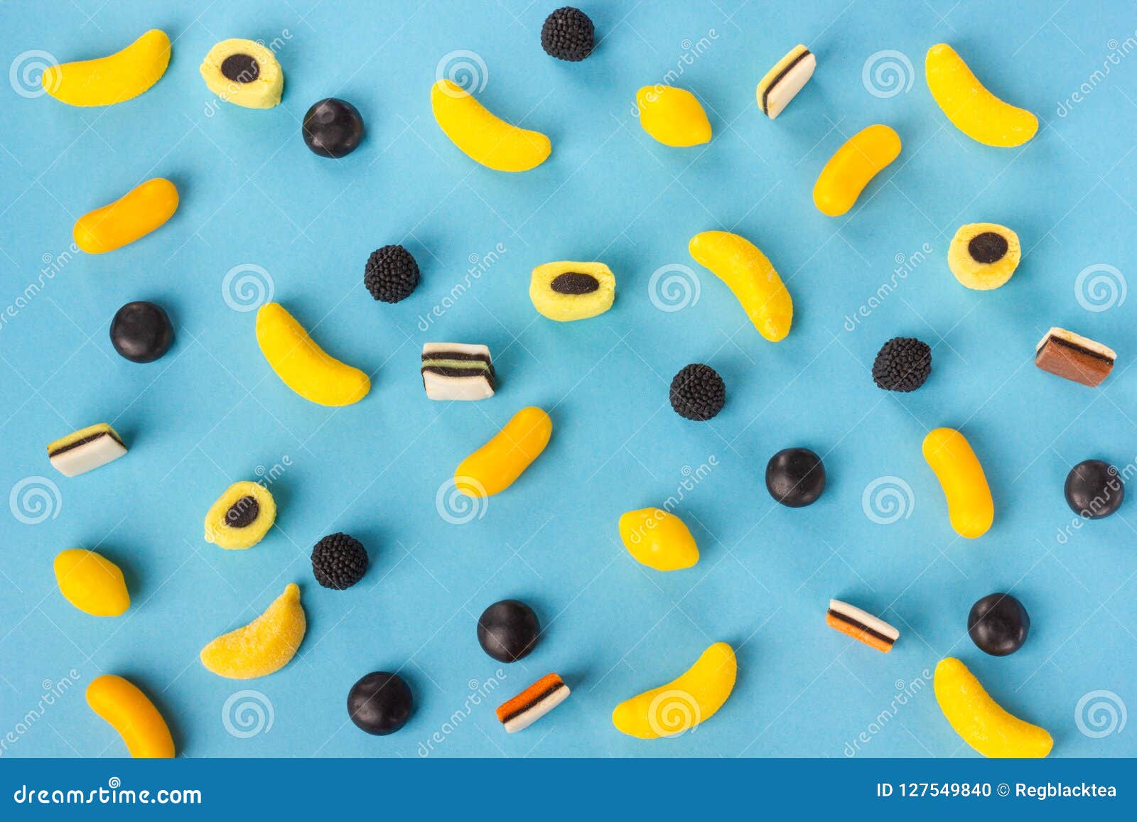 Variety of Colorful Candy Pattern on Blue Background. Stock Photo ...
