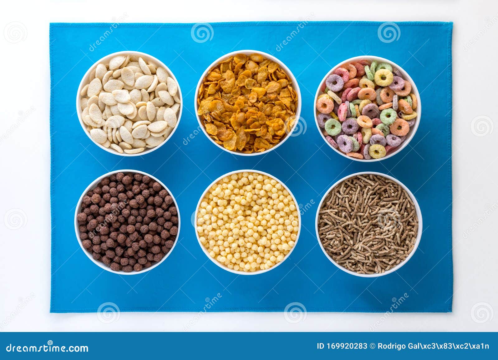 Cereals Ordered in Bowls on Cyan Background Stock Image - Image of ...