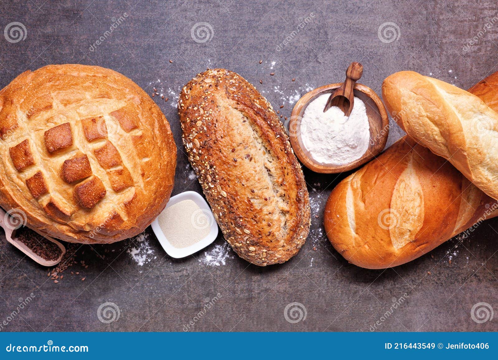 Top View Table Scene of Various Fresh Baked Breads on a Dark Background ...