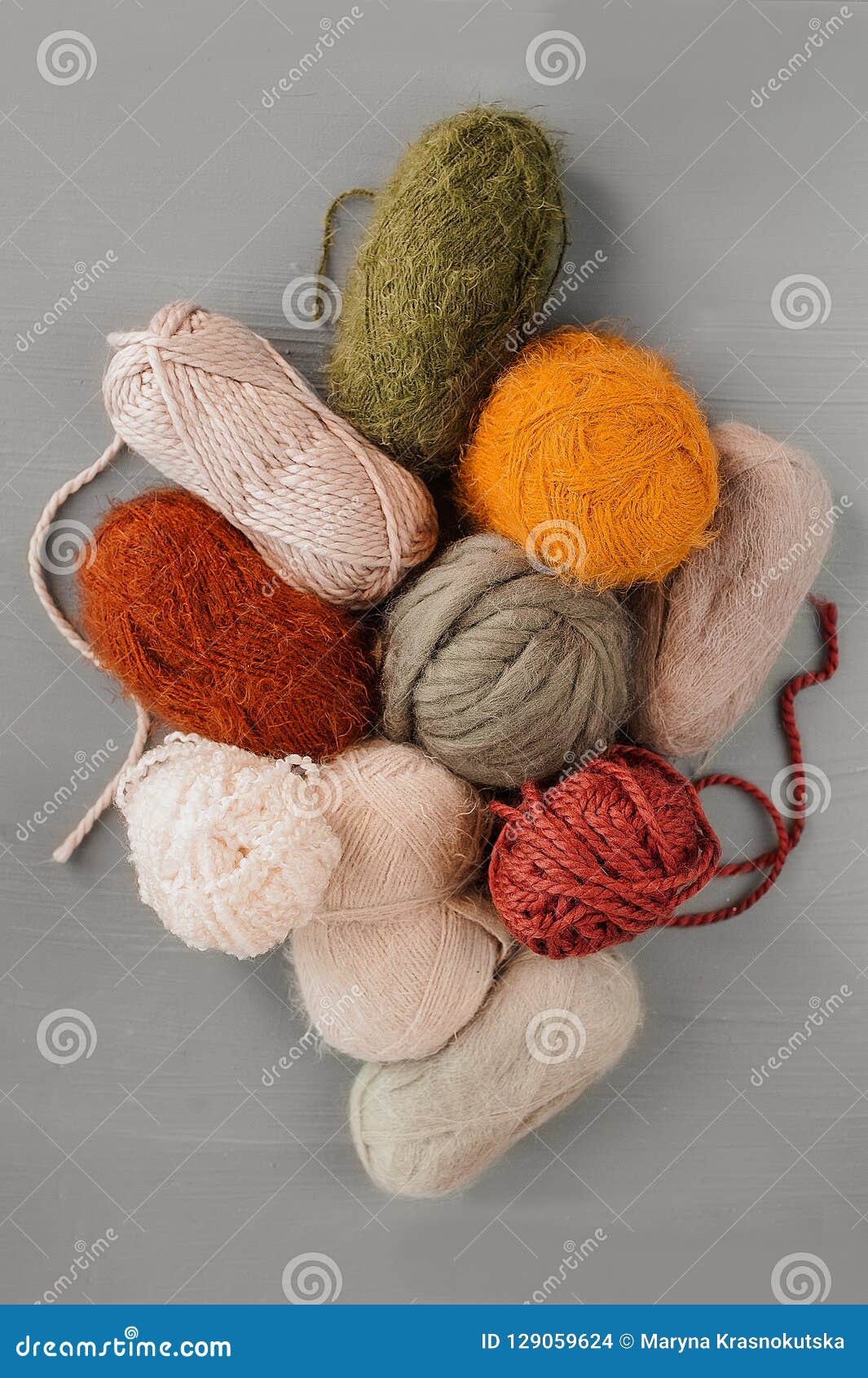 Variety of Knitting Yarns on Grey Background. Stock Photo - Image of ...