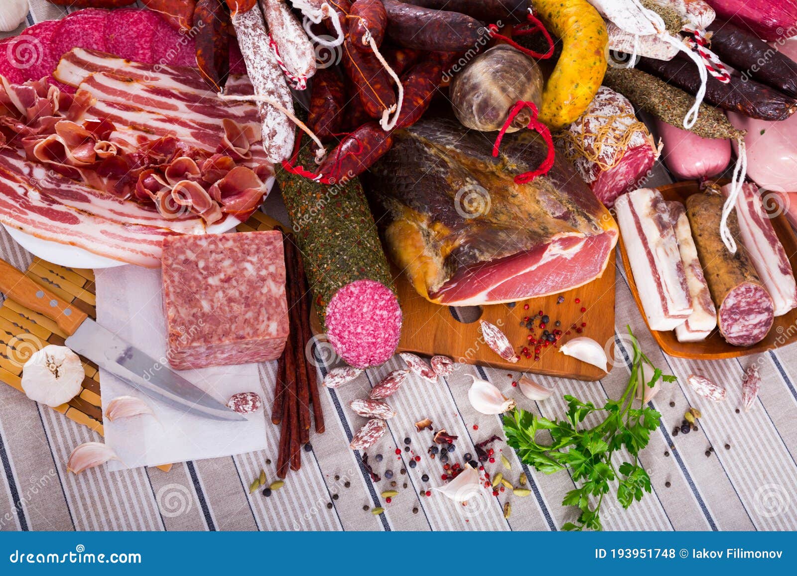 Variety of meats on table stock photo. Image of food - 193951748