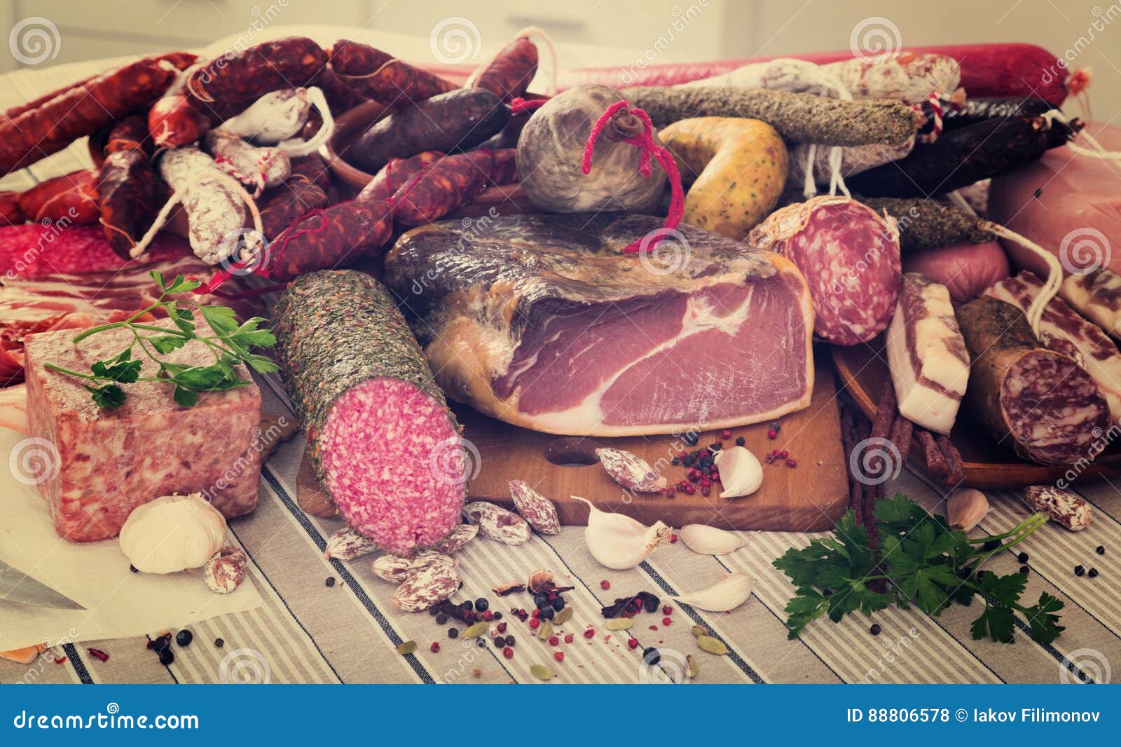 Variety of meats on table stock photo. Image of assortment - 88806578