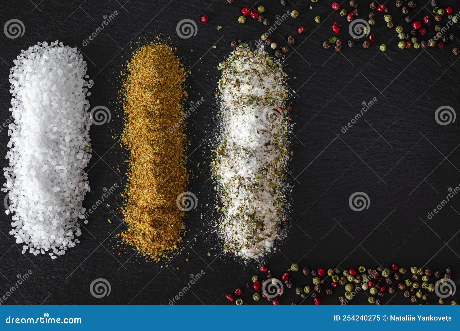 Variety of Natural and Spicy Salt on Black Table Stock Image - Image of ...