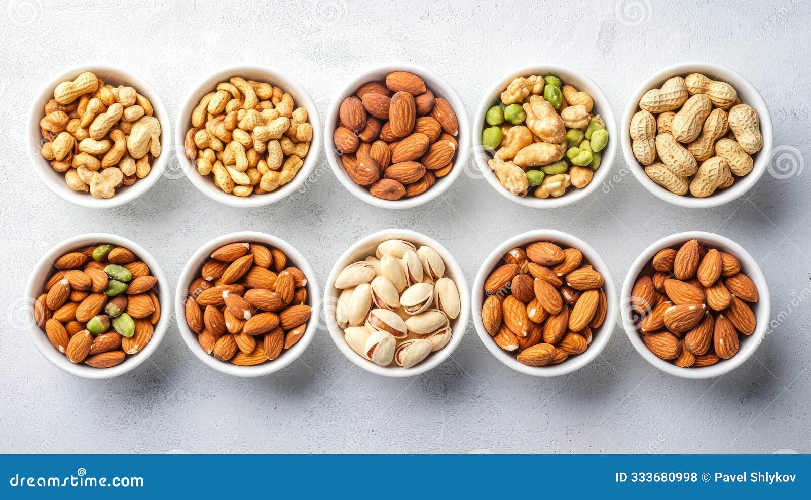 Variety of Nuts in Small White Bowls Healthy Snacks Stock Photo - Image ...